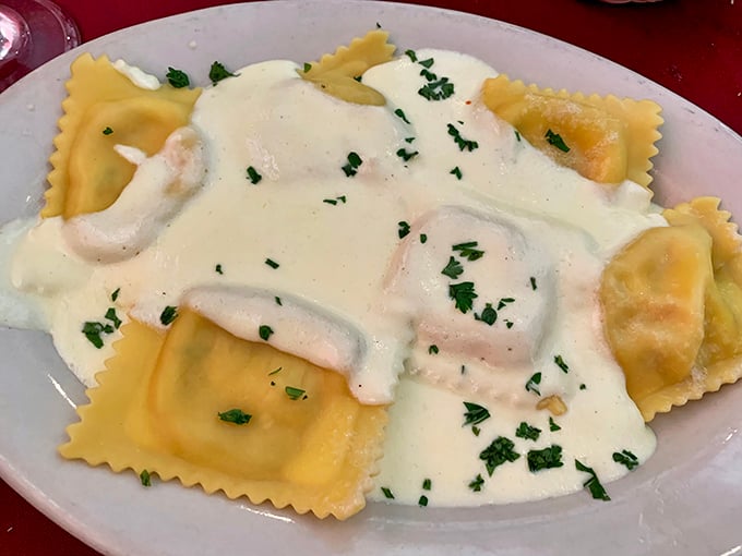 These ravioli pillows aren't just filled with cheese—they're filled with the kind of comfort that makes you want to call your mother and apologize for everything.