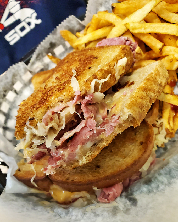 Not just a Reuben—a masterclass in sandwich architecture where sauerkraut, corned beef, and melted cheese create the holy trinity of lunchtime perfection.