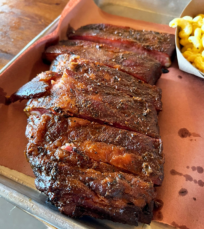 These ribs don't "fall off the bone"—they have just the right resistance that true barbecue aficionados recognize as textural perfection.