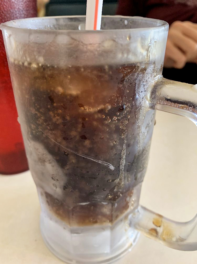 This root beer isn't just a beverage, it's a frosty mug of nostalgia that makes you wonder why we ever complicated things with artisanal sodas.