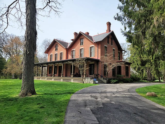 Rutherford B. Hayes' stately brick mansion sits with dignified grace among towering trees, a presidential legacy you can actually touch.