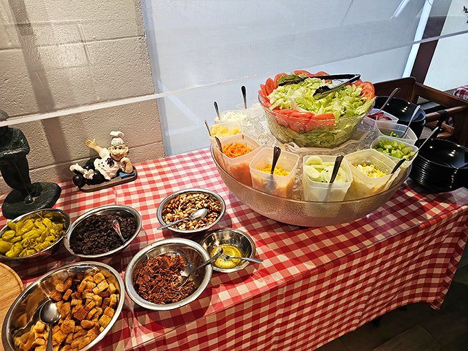The salad bar offers a colorful prelude to the main event. Like stretching before a marathon, it's preparation for what's to come.