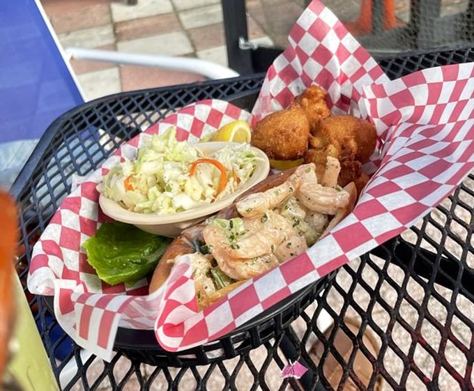 Seafood served in classic red-checkered paper – where presentation takes a backseat to flavor, exactly as it should.