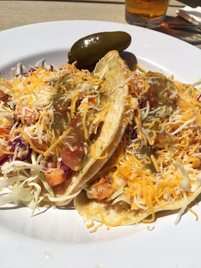 These shrimp tacos arrive dressed to impress, proving that seafood and Mexican flavors are a match made in coastal heaven.