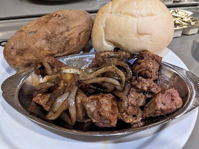 Sirloin tips with grilled onions—the working-class hero of the steak world. Simple, unpretentious, and absolutely delicious with that pillowy roll standing guard.