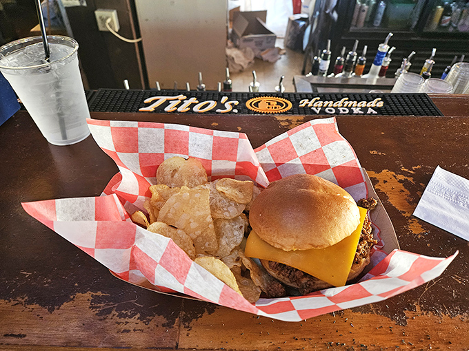 Simplicity perfected: a hearty burger with cheese that doesn't need fancy toppings to make its point. The pickle is just showing off.