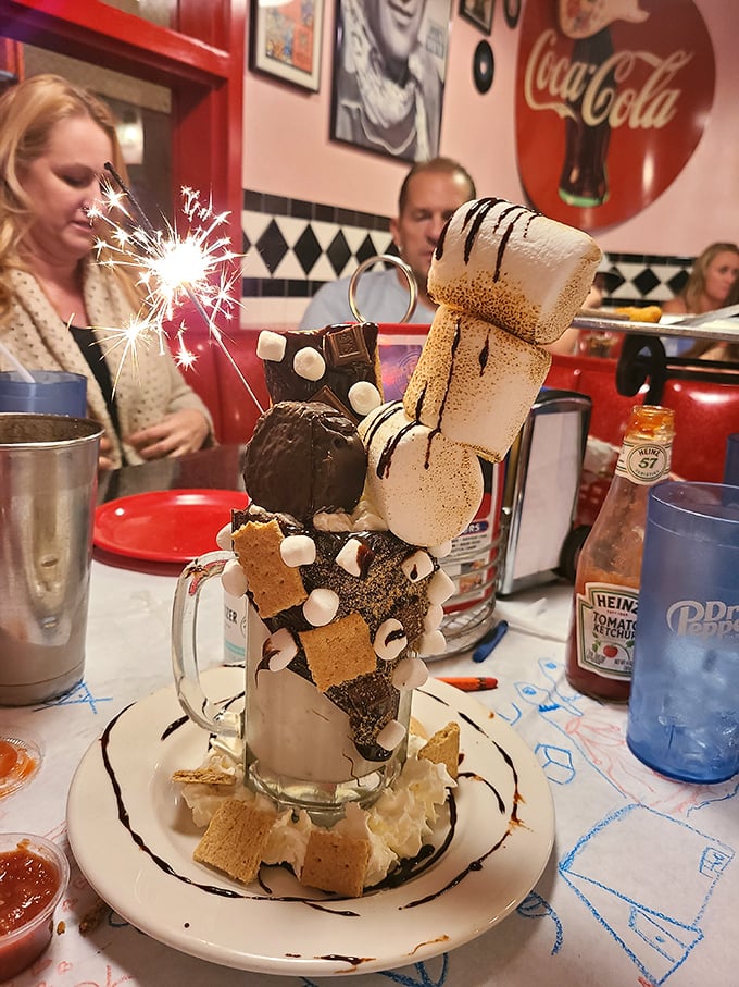 Not just a dessert—it's performance art! This s'mores creation comes complete with sparkler, making your inner child jump for joy.