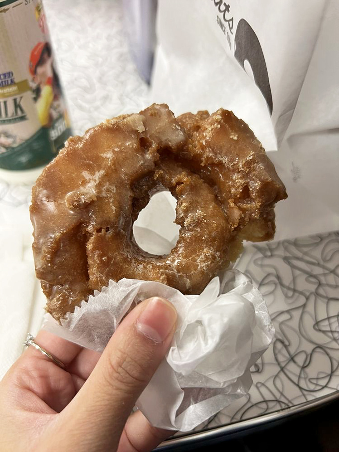 The humble apple fritter – a craggy, glorious monument to excess that somehow maintains its dignity despite being absolutely irresistible.