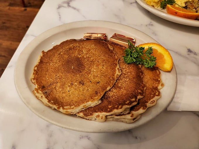 Golden-edged pancakes that strike the perfect balance between fluffy and substantial—the breakfast equivalent of finding a parking spot at the beach.