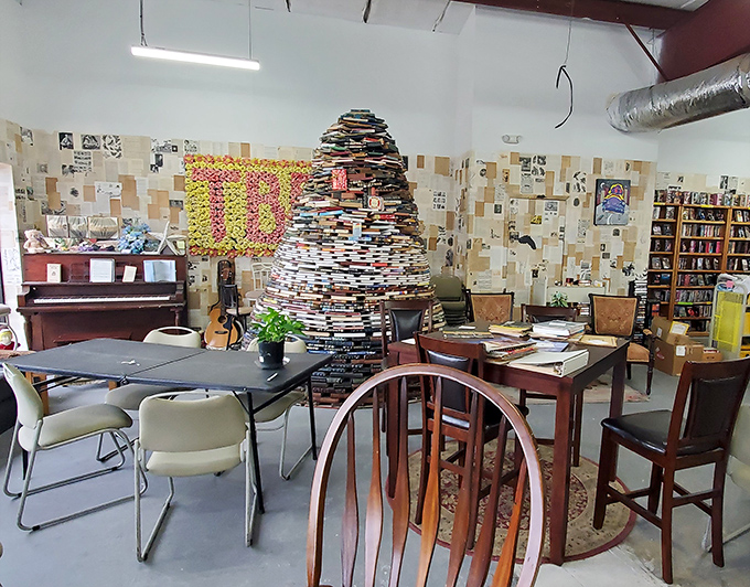 The community table area feels like your eccentric book-loving aunt's living room—in the absolute best way possible. 