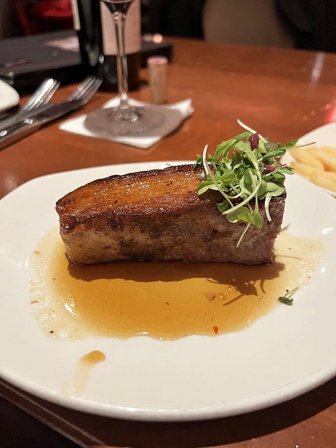 Pork belly that's achieved culinary nirvana—crispy exterior, meltingly tender inside, with a sauce you'll want to bottle and take home.