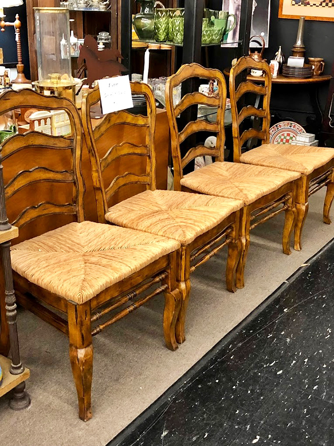 These ladder-back chairs aren't just furniture—they're a family tree of dinners past. Each woven seat has supported generations of Sunday suppers.