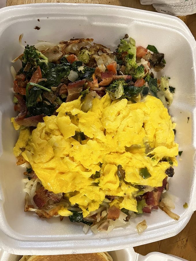 Vegetables never had it so good—nestled under perfectly scrambled eggs, this veggie skillet makes "eating your greens" feel like cheating.