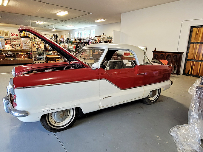 Detroit's golden age rolls into Parkman! This pristine vintage automobile isn't just transportation—it's a time machine on whitewalls.