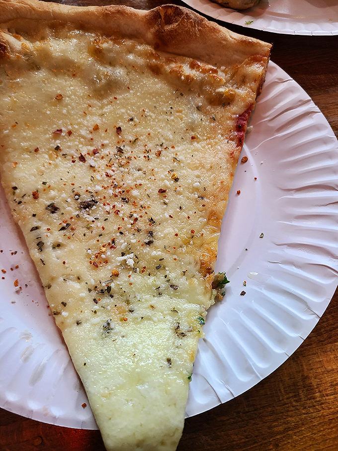 White pizza that proves sometimes less is more. Like a great jazz solo, it's about the notes they don't play—simple, elegant, and utterly satisfying.