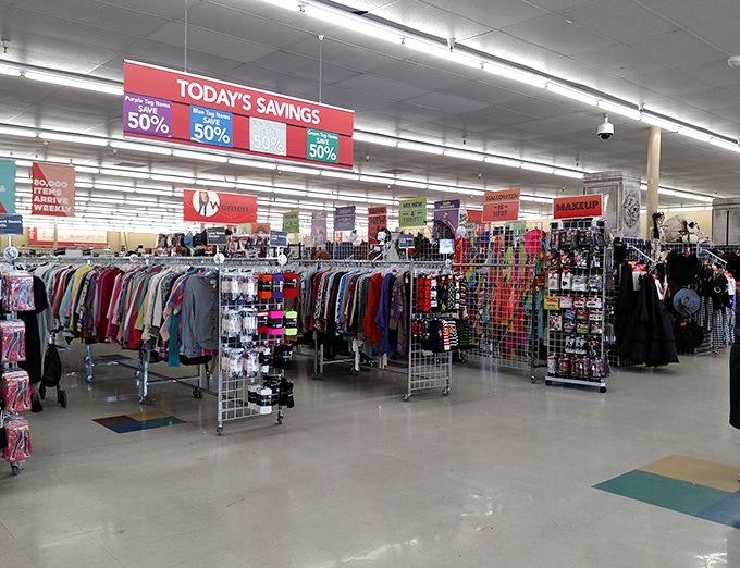 Beneath the "TODAY'S SAVINGS" banner, color-coded tags reveal which treasures are half-off—a thrifter's equivalent to winning the lottery.