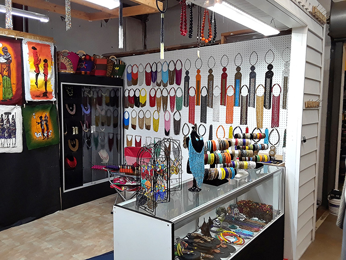 A rainbow of handcrafted accessories adorns this booth, where global artistry meets local shopping in a vibrant display.