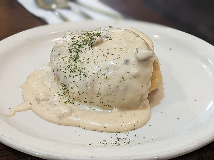Biscuits and gravy – the comfort food equivalent of a warm hug from your favorite grandparent, with a sprinkle of herbs for that extra touch of love.