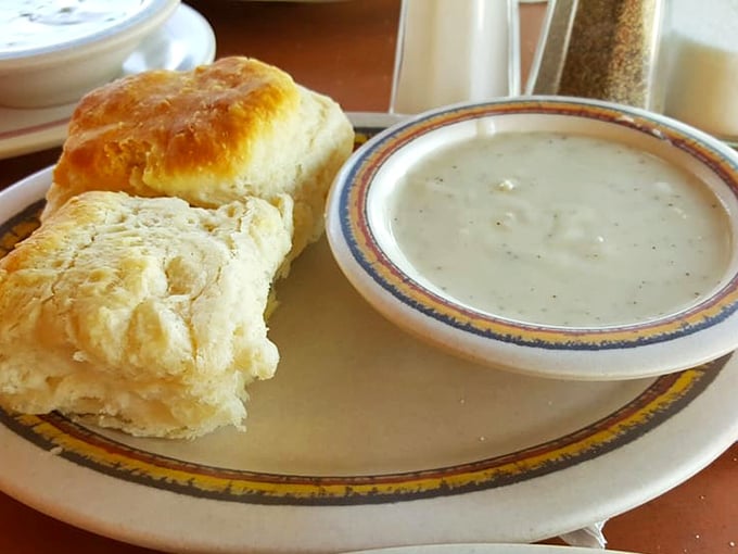 Fresh biscuits swimming in creamy gravy - comfort food that could make a grown trucker shed tears of pure happiness.