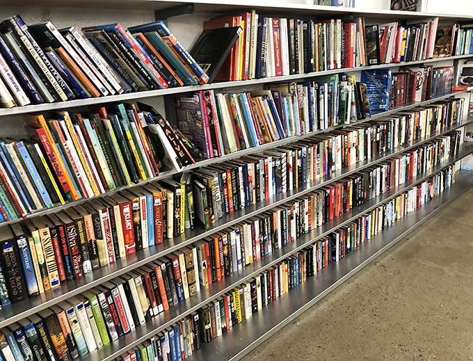 The literary corner – where dog-eared paperbacks and hardcover treasures create a secondhand library that would make any bookworm swoon.