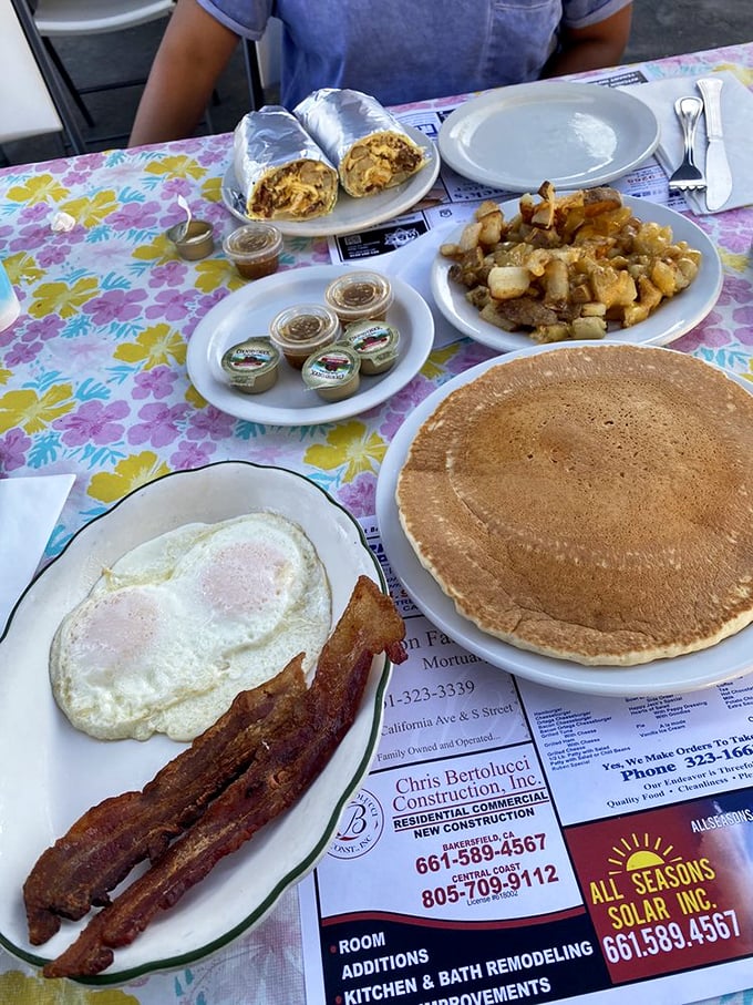 Breakfast spread that would make Ron Swanson weep with joy. Those golden-brown potatoes aren't "breakfast adjacent"—they're the main event.
