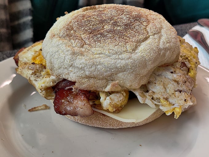 This breakfast sandwich isn't just stacked – it's architected with the structural integrity of the Golden Gate Bridge and twice the satisfaction.