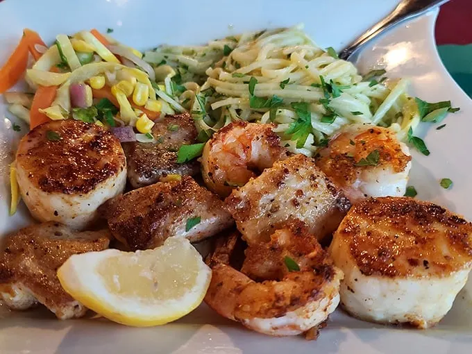 The seafood platter arrives like a greatest hits album of the ocean—scallops, shrimp, and fish sharing the spotlight in perfect harmony.