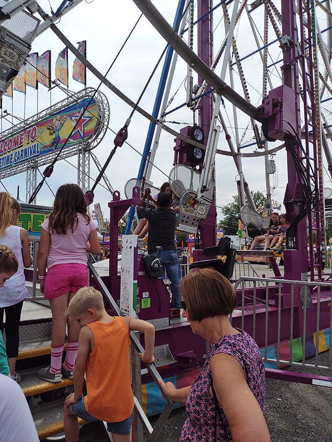 Not just shopping—the fairground rides remind us this is equal parts marketplace and memory-maker for families seeking weekend adventures.