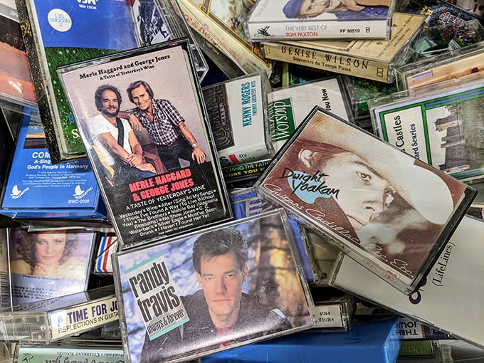 Musical memories in plastic cases – a time capsule of country legends and '80s heartthrobs waiting to soundtrack your next road trip.