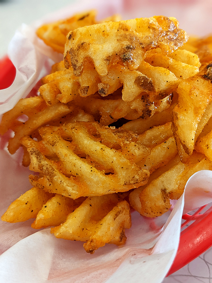 Waffle fries that make regular fries question their life choices. Crispy, seasoned, and ready for their close-up.