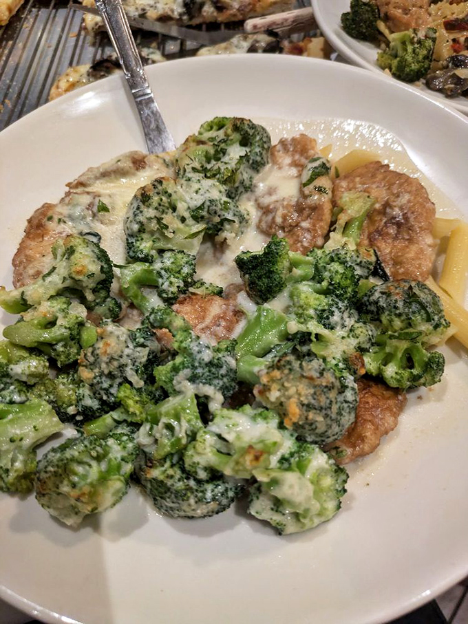 Chicken and broccoli swimming in creamy sauce—proof that vegetables can be persuaded to taste like vacation when properly introduced to Alfredo.
