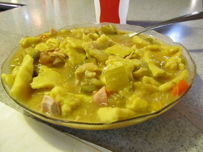 Chicken pot pie that would make your grandmother both jealous and proud. This isn't soup—it's comfort in a bowl with homemade noodles swimming in golden glory.