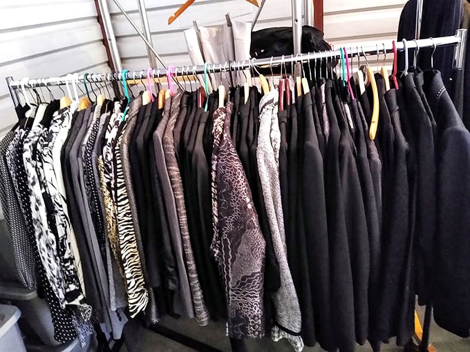 A rack of patterned and solid coats stands ready for their second chapter—fashion archaeology at its finest.