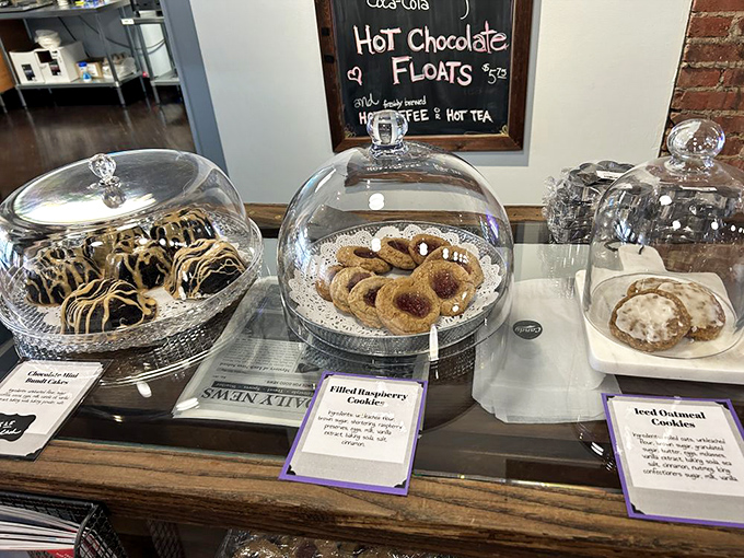 Cookie domes of delight! Under these glass bell jars lies the answer to life's problems - perfectly arranged cookies waiting to solve your day.