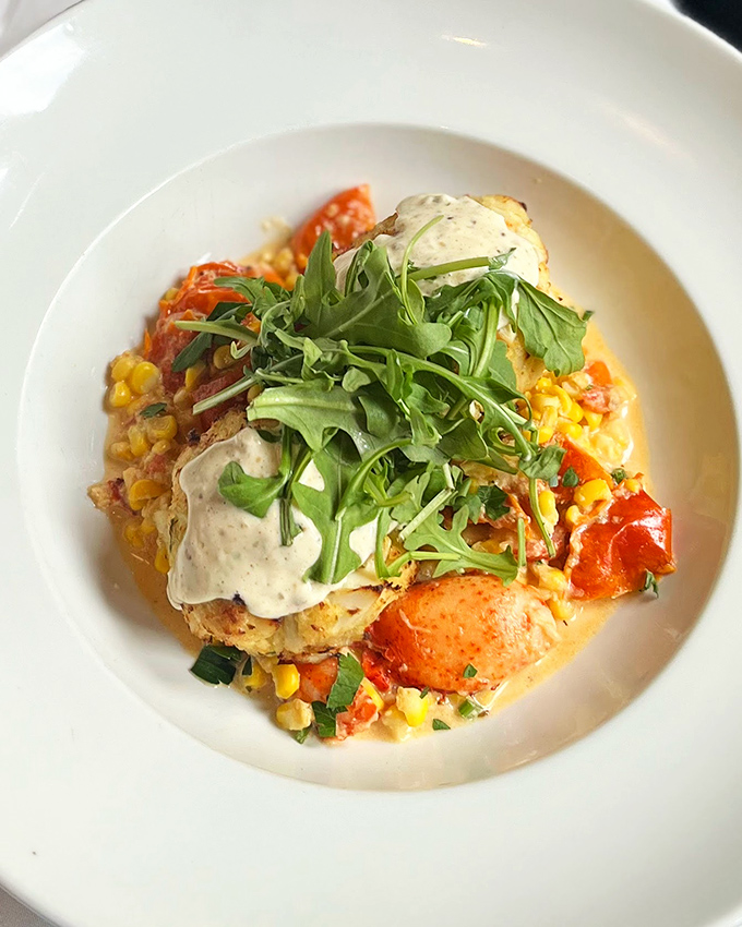 A symphony of colors and textures—this crab cake creation proves vegetables can hang with the cool kids when properly introduced.