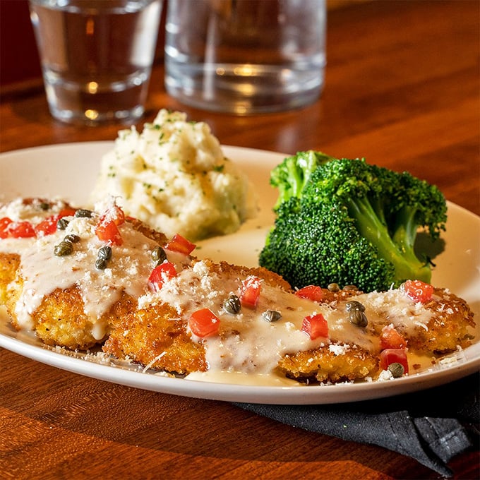 Crispy on the outside, tender within—this seafood dish with mashed potatoes and broccoli is the culinary equivalent of business suit with comfy slippers.