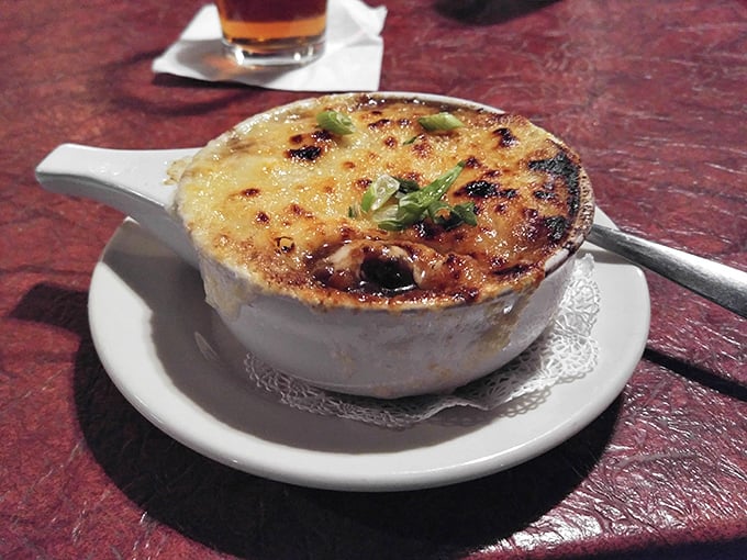 Bubbling cheese blankets rich broth like a delicious edible security blanket for your taste buds.