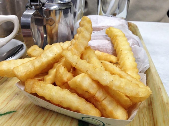 French fries with the perfect crinkle-to-crunch ratio – the supporting actor that sometimes steals the show from the sandwich stars.