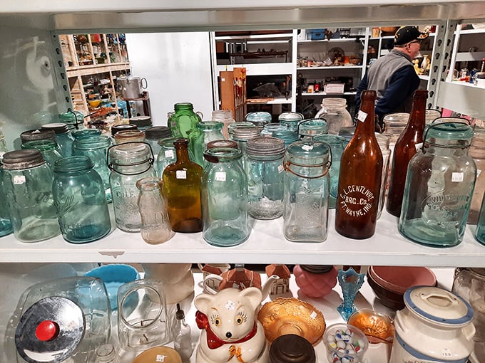 Blue Ball jars and amber bottles—each glass vessel holds not just space but stories of kitchens long past.