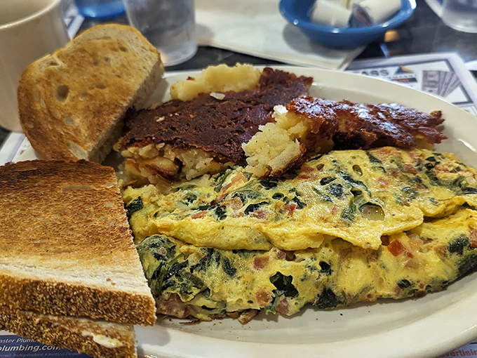 The Greek omelet—where spinach and feta find their egg-cellent destiny. Socrates himself would pause philosophizing for this masterpiece.