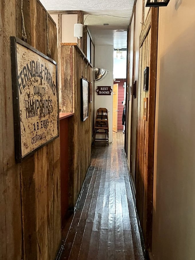 Narrow hallways with weathered wood walls tell stories of countless footsteps over decades—each creak a different chapter in mill history.