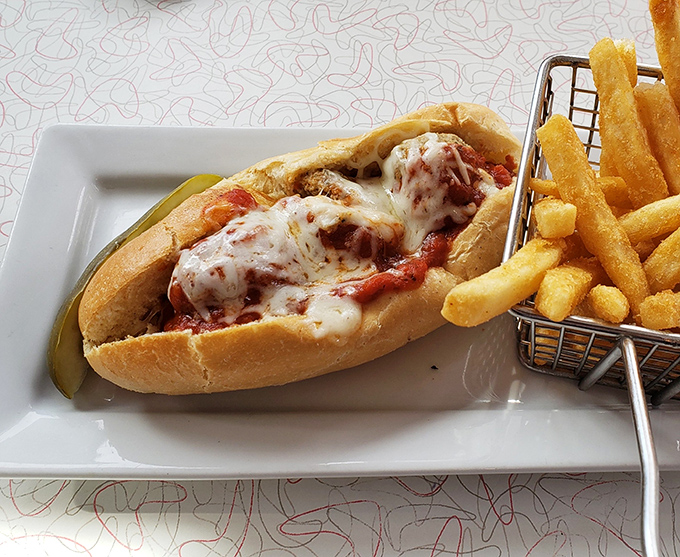 This isn't just a sandwich—it's architectural perfection where melted cheese meets marinara in a dance as old as Route 66 itself.