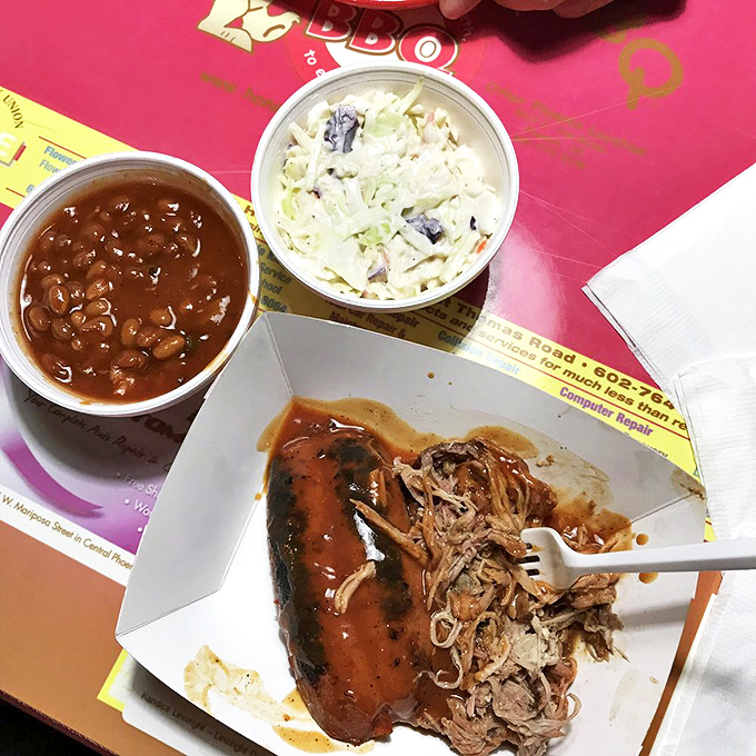Cowboy beans and coleslaw—the unsung heroes that balance the BBQ experience like reliable character actors in your favorite film.
