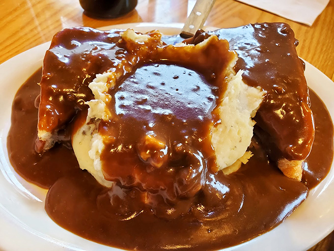 Comfort food alert! This hot roast beef sandwich swimming in rich gravy is what mashed potatoes dream about at night.