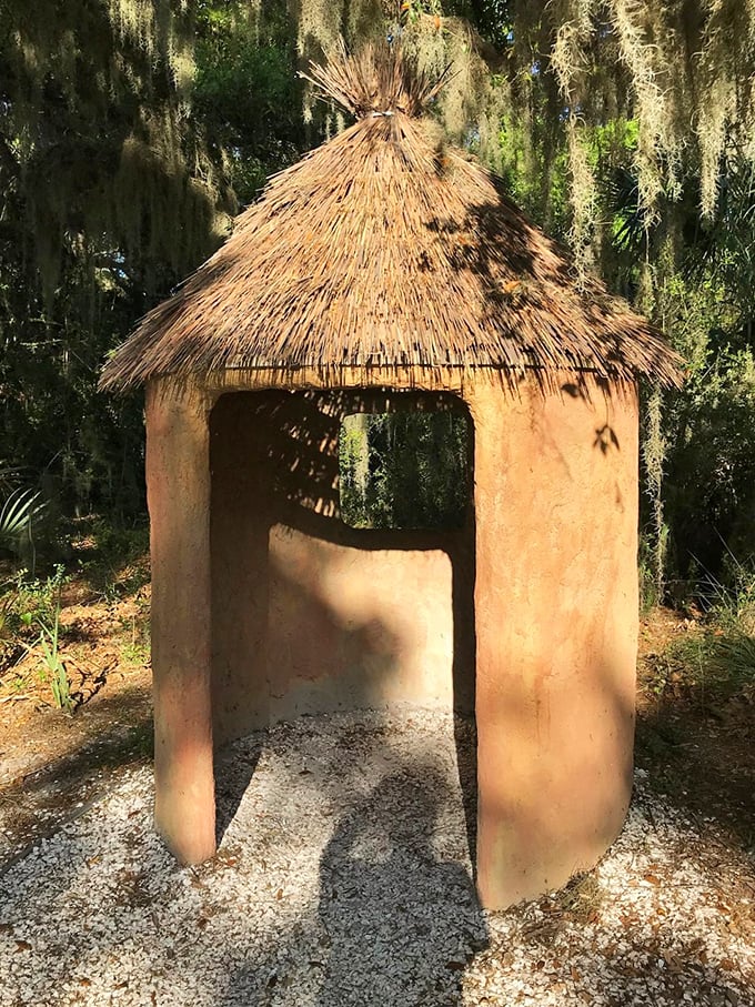This thatched-roof hut isn't just charming—it's a portal to understanding coastal history. Like time travel without the complicated physics.
