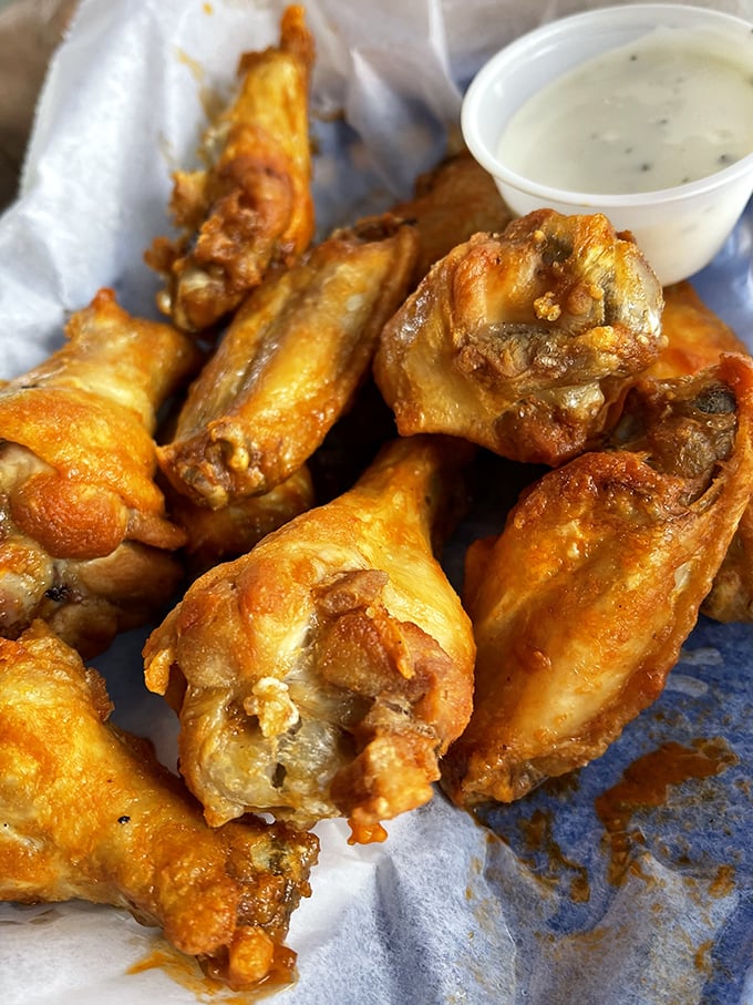 Wings so perfectly golden and crispy, they deserve their own Florida state holiday. Cancel all afternoon appointments.