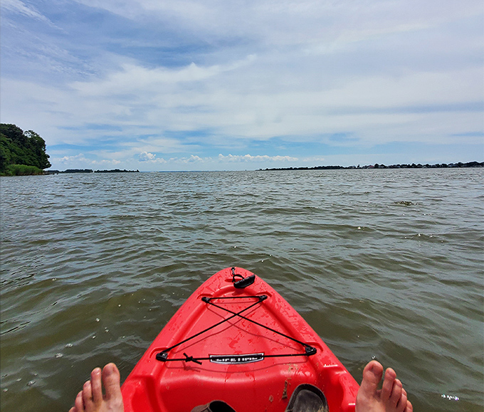 Red kayak, blue water, open horizon—sometimes the simplest equations yield the most profound results.