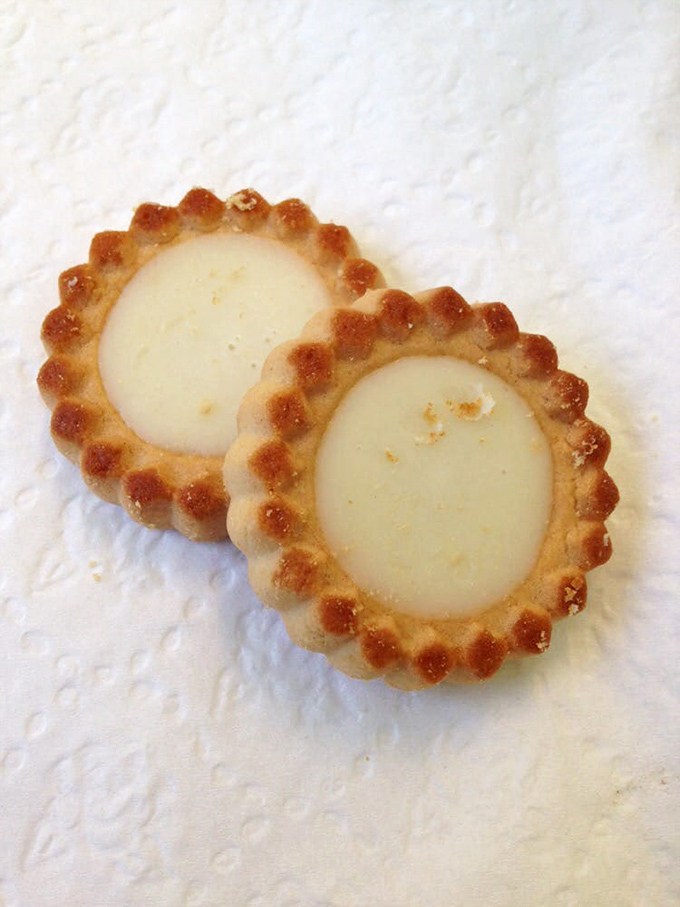 Tiny tart treasures! These bite-sized key lime cookies feature the perfect ratio of buttery crust to tangy filling – dangerous in their pop-ability factor.