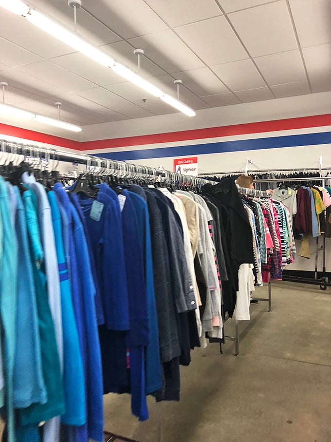 Children's clothing and accessories arranged with military precision—because outfitting growing kids shouldn't require a second mortgage or selling a kidney.