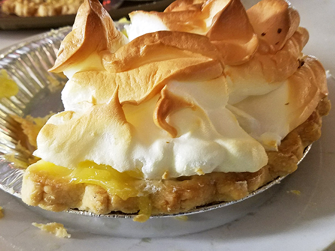 The lemon meringue pie wears its meringue like a fluffy crown. This isn't just dessert—it's edible architecture with a perfect sweet-tart balance.